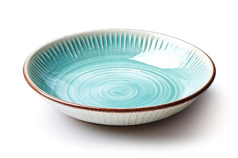 Elegant Turquoise Serving Bowl Displayed On A Rustic Wooden Table Under