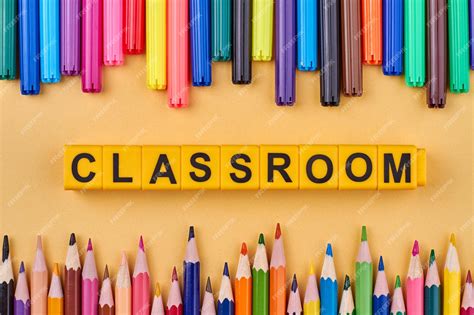 Premium Photo The Word Classroom Written On Yellow Cubes School