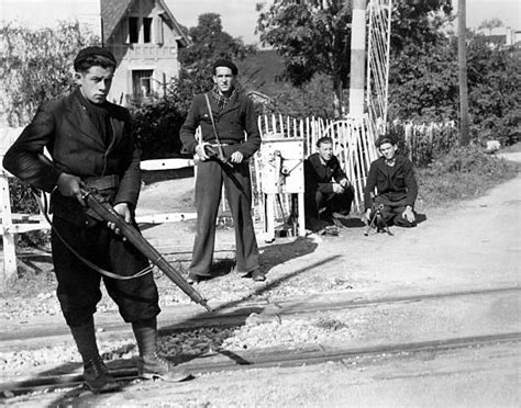 French Partisans Controlling A Checkpoint On The Road To Switzerland
