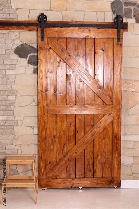 Sliding Barn Wooden Door In Indoors Sliding Old Barn Door In Modern Room Rustic Farm Wood