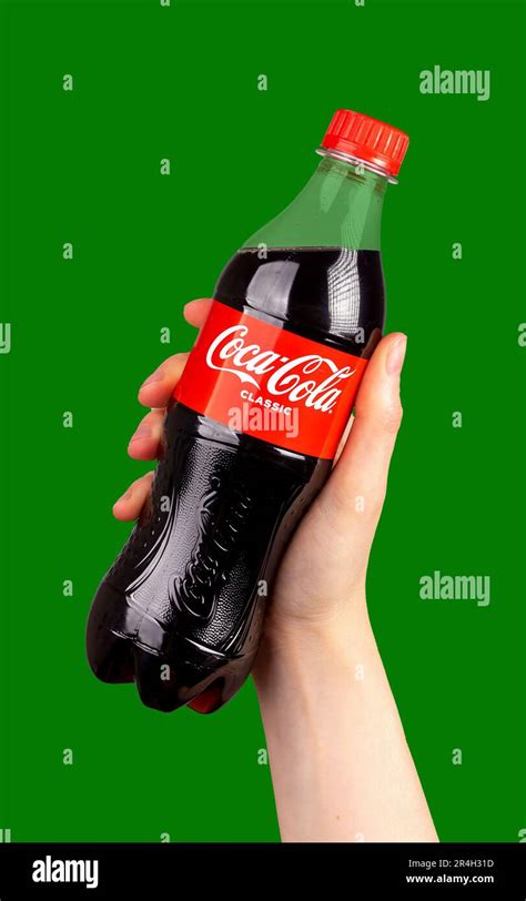 Berlin Germany May 23 2023 Hand Holding Cola Drink Packed In Plastic