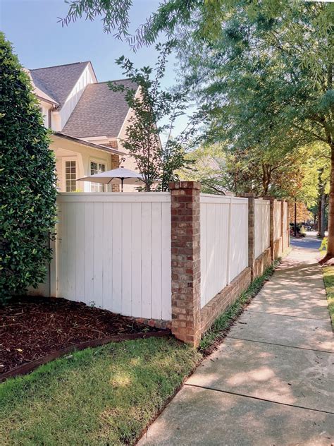 Portfolio Highlight Wood Fence With Brick Columns Heron Building Co