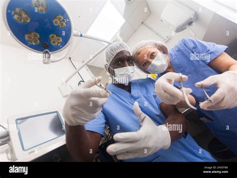 Patient From The Operating Table View Of The Surgical And Assistant