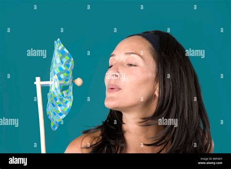 Girl With A Toy Windmill Stock Photo Alamy