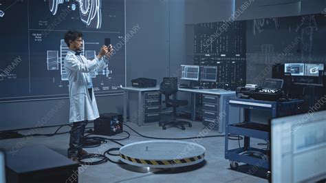 Scientist Using Tablet In A Research Laboratory Stock Image F043 2733 Science Photo Library