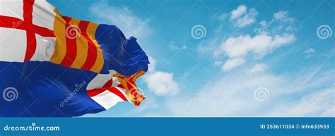 Official Flag Of Barceloneta Puerto Rico Untied States Of America At Cloudy Sky Background On