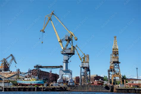 Loading Cranes At The Sea Port Cargo Transportation By Ships Stock Photo Adobe Stock