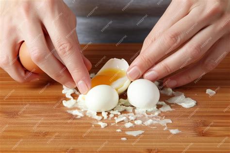 Premium Ai Image Woman Hands Breaking An Egg To Separate Egg White