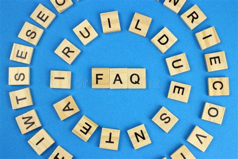 The Word Faq Is Made Of Wooden Letters On A Blue Background Stock Image Image Of Frequently