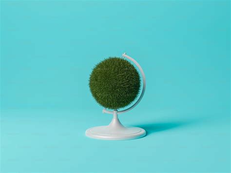 Grass Earth Globe On Blue Background Minimal Concept Of Ecology And