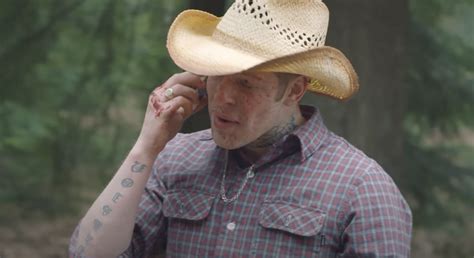 Tom Macdonalds Face Neck And Forehead Tattoos Out Of The Wilderness