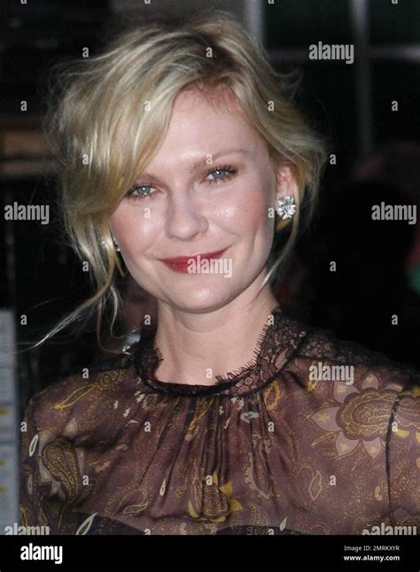 Kirsten Dunst Poses For Photos At The Premiere Of Melancholia At The Curzon Mayfair London