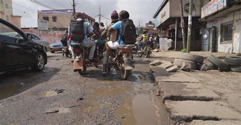 Busy Douala Street With Traffic And Motorbikes Free Stock Video Footage