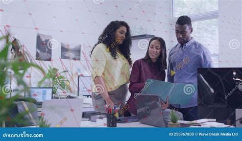 Animation Of Graph And Data Processing Over Diverse Male And Female Colleagues In Office