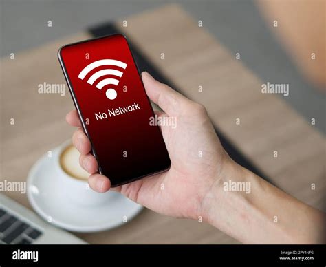 Smartphone In Man Hand Show No Network Signal Icon On The Screen Stock Photo Alamy