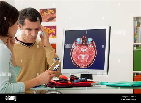 NEUROLOGY CONSULTATION MAN Stock Photo Alamy