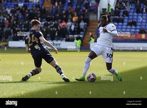 Omari Patrick Of Tranmere Rovers Looks To Dribble Past Kyle John Or Port Vale During The Sky Bet