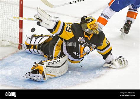 Pittsburgh Penguins Goalie Marc Andre Fleury 29 Makes A Save During