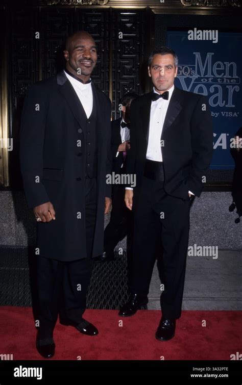 Evander Holyfield With George Clooney The 3rd Annual Gq Men Of The Year