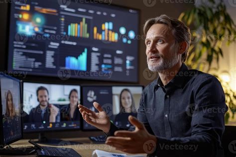 man explaining data visualizations on digital screens in conference