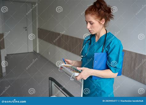 Doctor Fine Tuning The Remote Monitoring Control Panel In Hospital Stock Image Image Of
