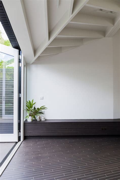 Angular Doors Connect Tapered Extension By Mustard Architects With Patio