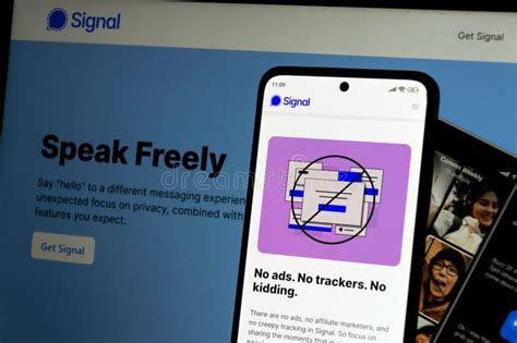 American Open Source Encrypted Messaging Service Signal App On Mobile App In Front Of Desktop