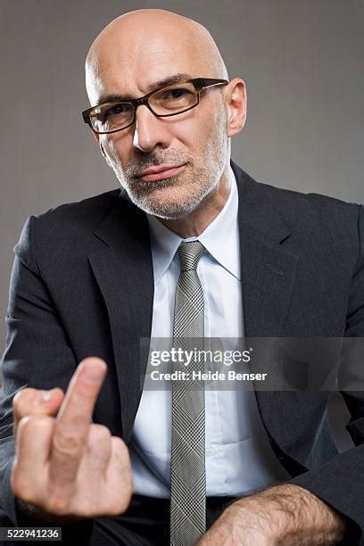Man Giving Middle Finger Imagens E Fotografias De Stock Getty Images