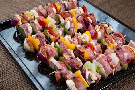 Premium Photo Raw Pork Skewers Ready For Grilling