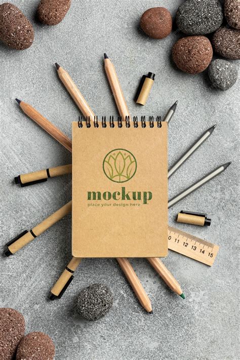 Premium Psd Flat Lay Of Paper Stationery With Stones