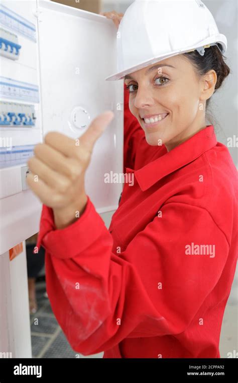 Happy Woman Measuring Electrical Current Stock Photo Alamy