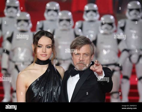 Actors Daisy Ridley Left And Mark Hamill Pose For Photographers Upon