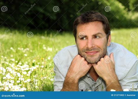 Portrait Of A Man On The Grass Stock Photo Image Of Sunny Thoughtful 21371002