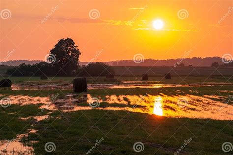 Beautiful Rural Landscape At Sunset Moments After A Storm Flooded