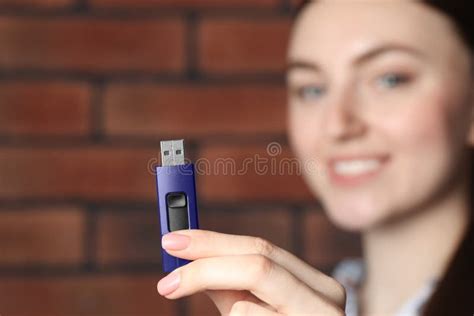 Woman Holding Usb Flash Drive Near Brick Wall Focus On Hand Stock Image Image Of Hand File