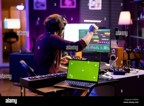 Sound Engineer Enhancing Volume Levels On Daw Software Editing