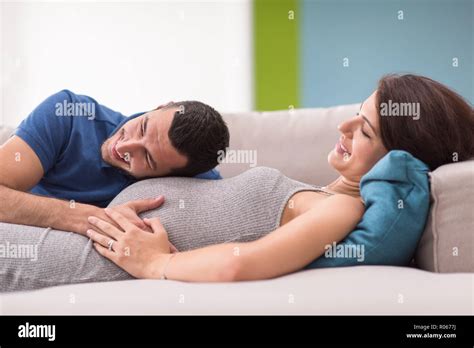 Happy Future Dad Listening The Belly Of His Pregnant Wife While