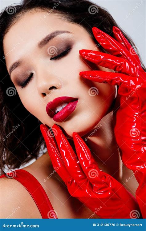 Vertical Photo Of Stunning Young Lady Touch Face Closed Eyes Wear Red Leather Garment Isolated