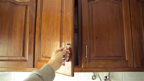 How To Degrease Your Kitchen Cabinets With This Common Pantry Item