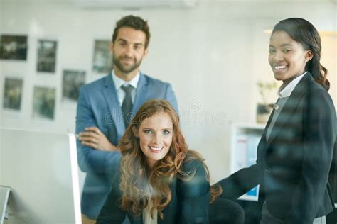 Weve Been Making Such Great Progress Together Portrait Of Colleagues Working Together In An