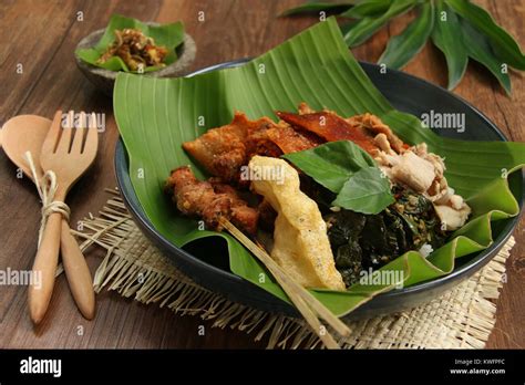 Nasi Campur Babi Guling Balinese Rice Dish Of Steamed Rice Topped With Variety Dishes Of