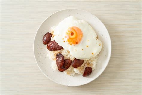 Premium Photo Rice With Fried Egg And Chinese Sausage