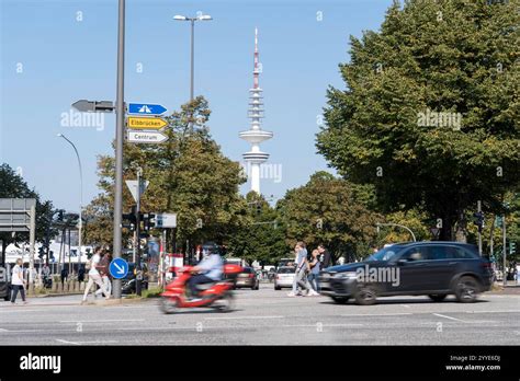 Busy Intersection With Directional Sign And Television Tower Fernsehturm In Hamburg Stock