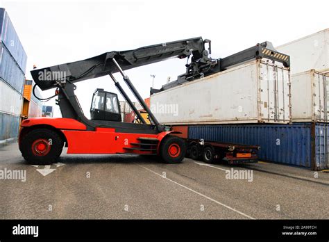 Loading And Unloading Of Containers In The Port Stock Photo Alamy
