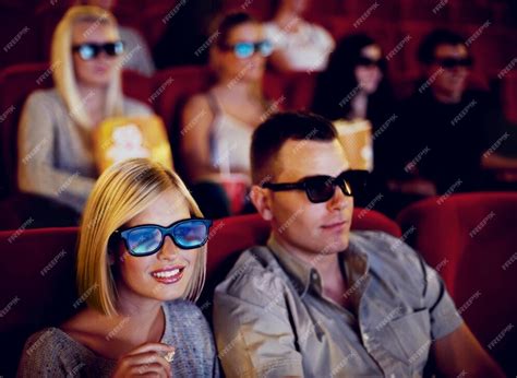 Premium Photo Cinema 3d Glasses And Couple Watching Film Eating