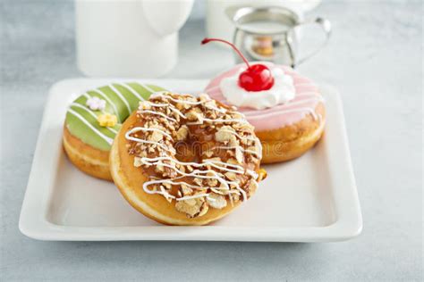 Assorted Glazed Fried Donuts On A Plate Stock Image Image Of Colorful