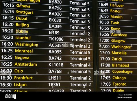 England London Heathrow Airport Flight Departure Board Stock Photo
