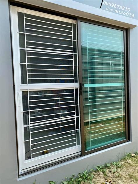 เหล็กดัดพร้อมมุ้งลวด สแตนเลสแท้ ผ้าม่าน Ennxo