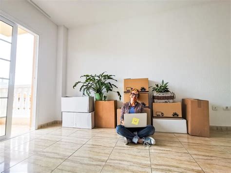 Premium Photo Potted Plant On Floor Against Wall At Home