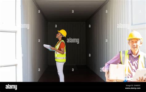 Woman Foreman Control Loading Containers Box In Warehouse Worker Inspector Or Safety